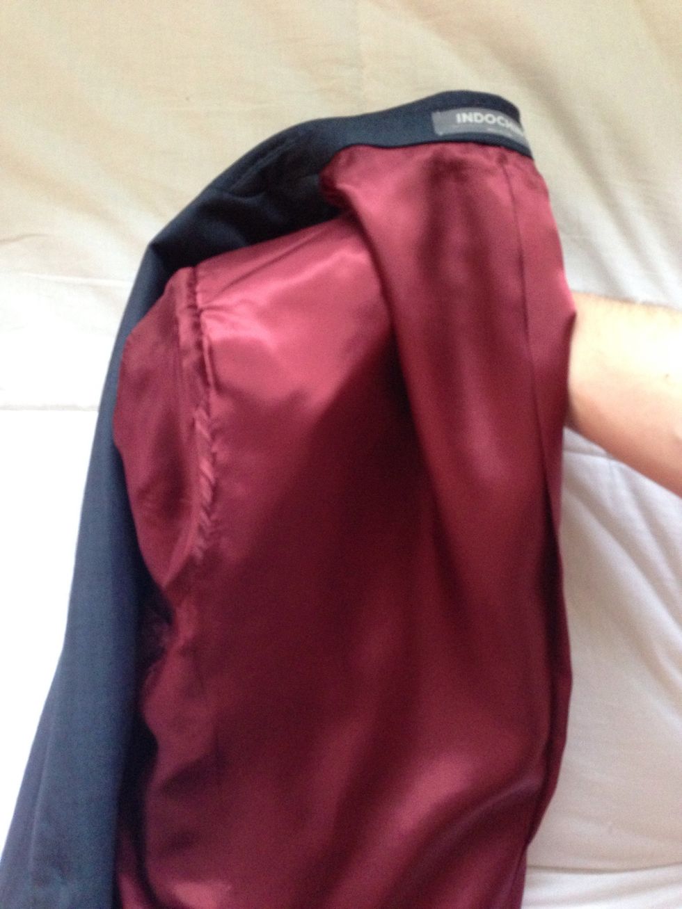 How to fold a suit coat or blazer (for travel) - B+C Guides