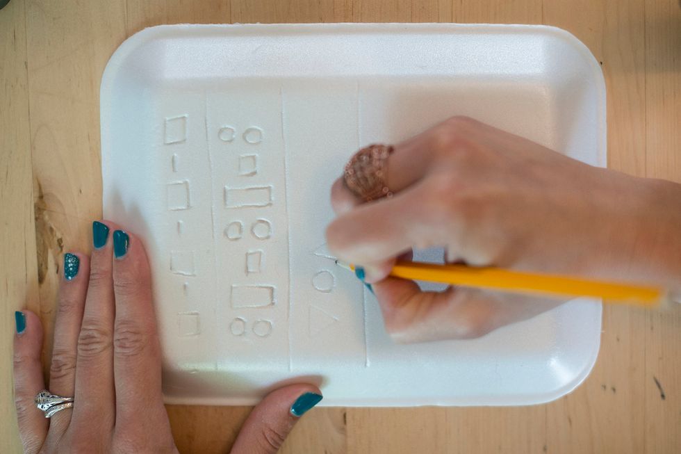 Then, you will wipe your paper with a wet cloth. Be careful to not soak ...