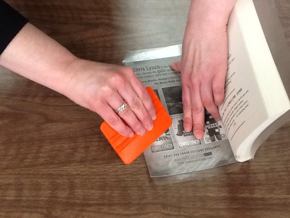 How to apply laminate to a paperback book - B+C Guides