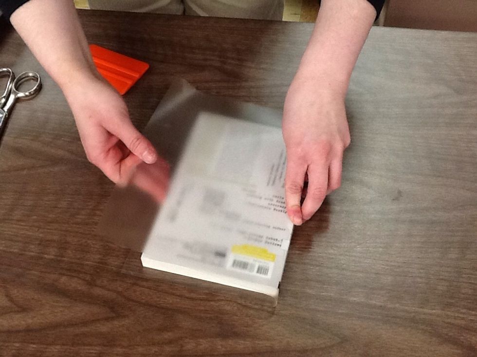 How to apply laminate to a paperback book - B+C Guides