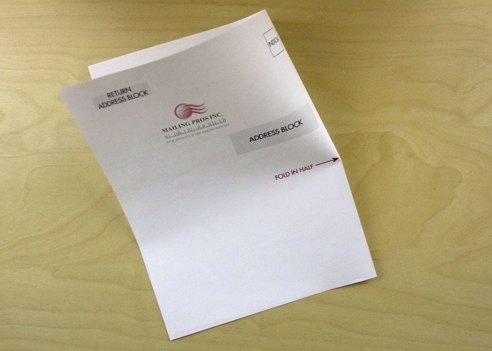 How to fold a 11x17" quarter fold mailer with tabs - B+C Guides