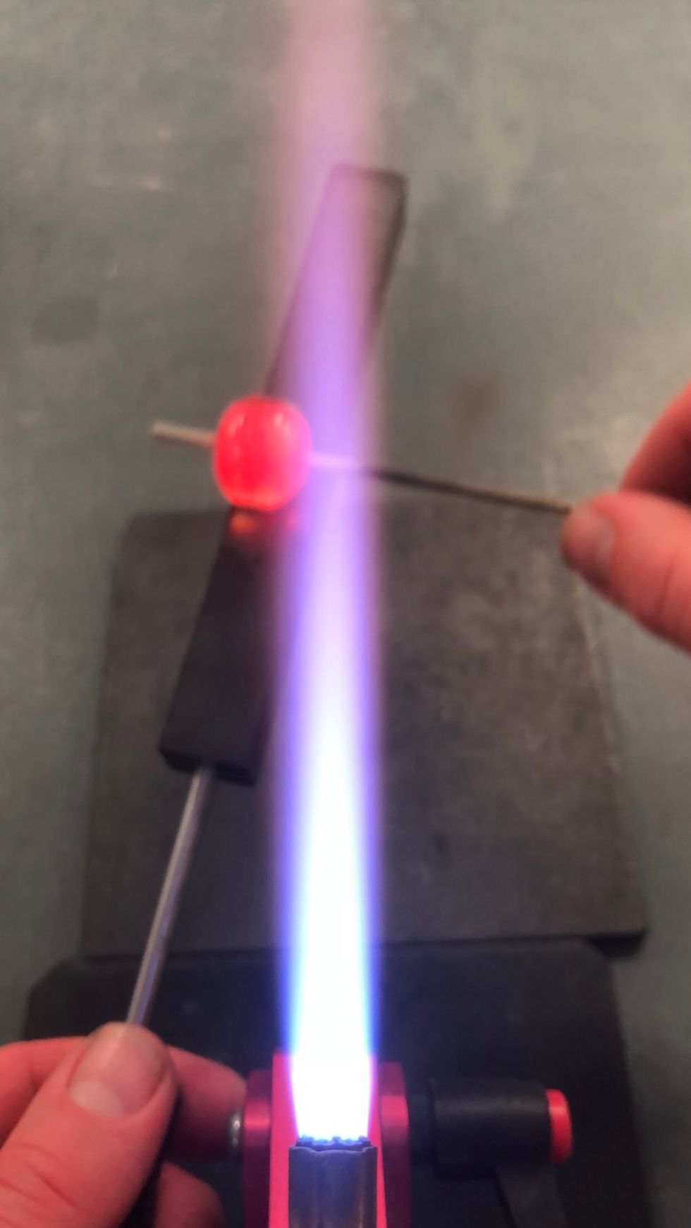 Gently marver the bead using the back of the beadroller to shape the ...