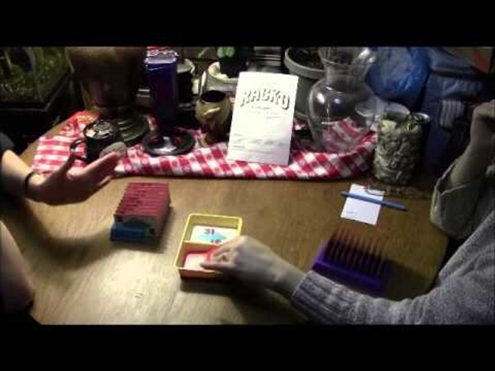 Next you draw a card from the draw pile or the discard pile. Then you ...