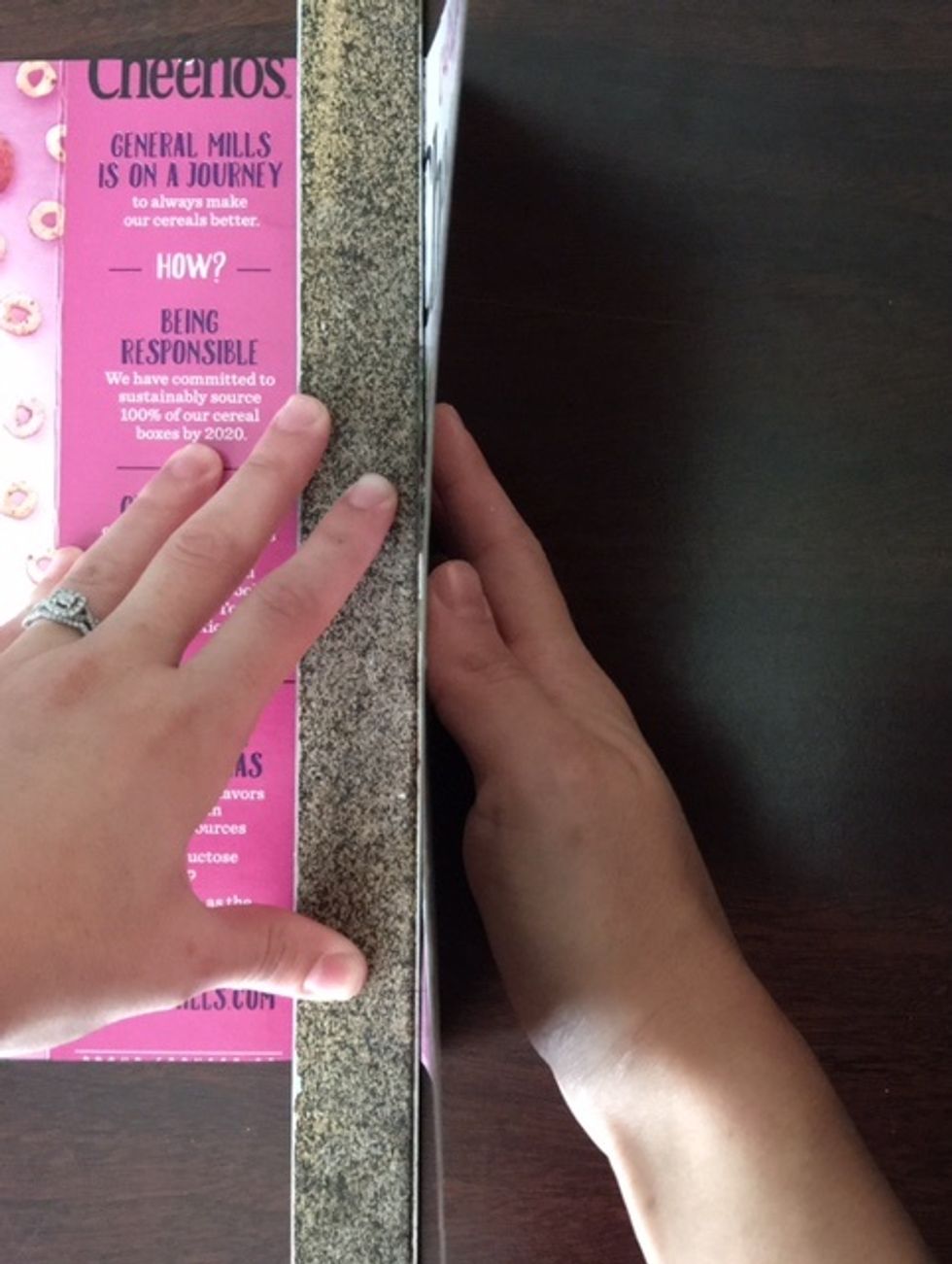 Line up your ruler with the Sharpie line on the right. Holding the ...