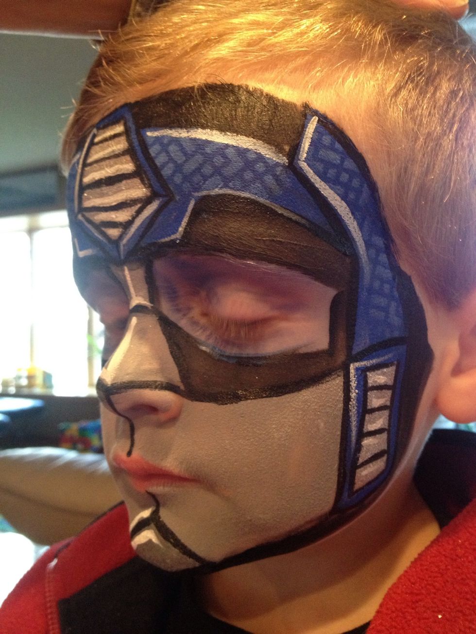 How to do an optimus prime transformers face painting - B+C Guides
