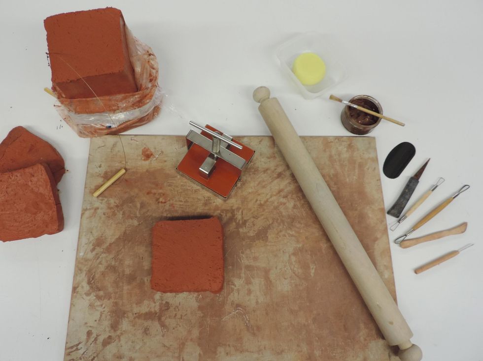 How to roll out a clay slab tile for wall installation - B+C Guides