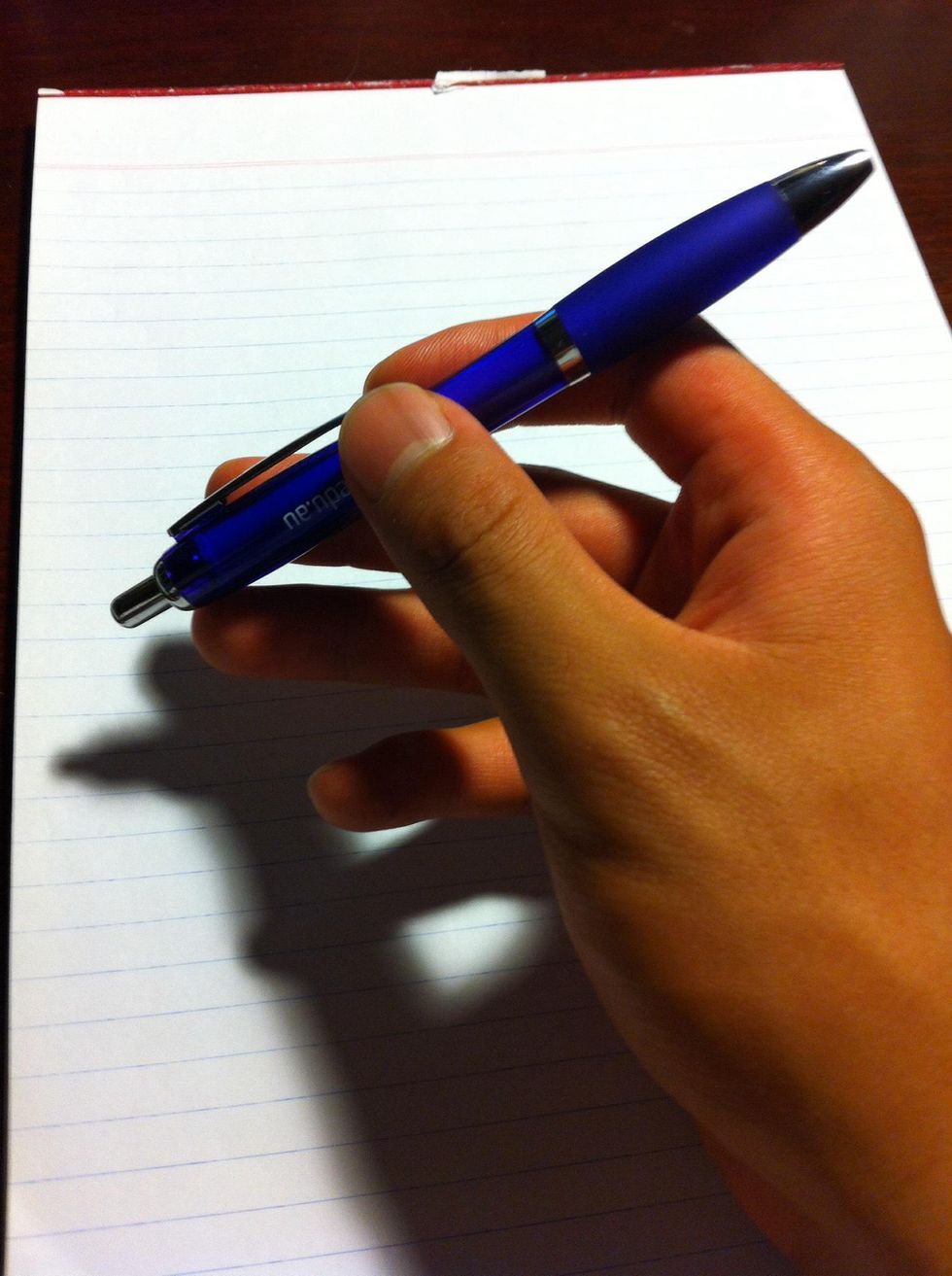 How to spin a pen in between your fingers - B+C Guides