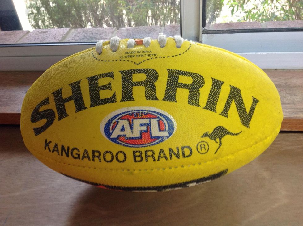 How to kick and handball a footy - B+C Guides