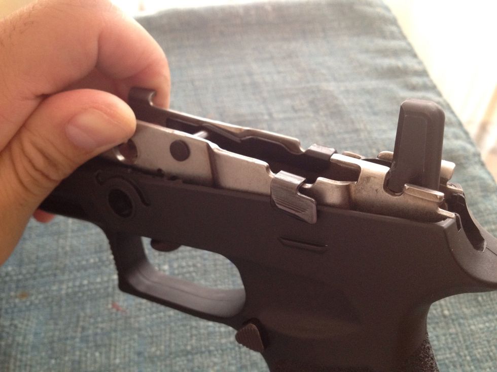 How to take apart a sig sauer p250 handgun - B+C Guides