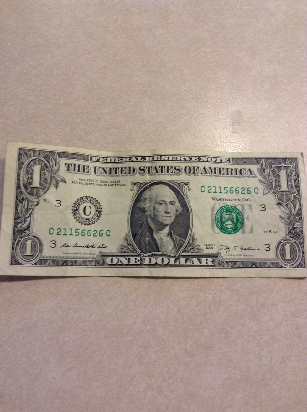 How to make a dollar bill origami bunny - B+C Guides