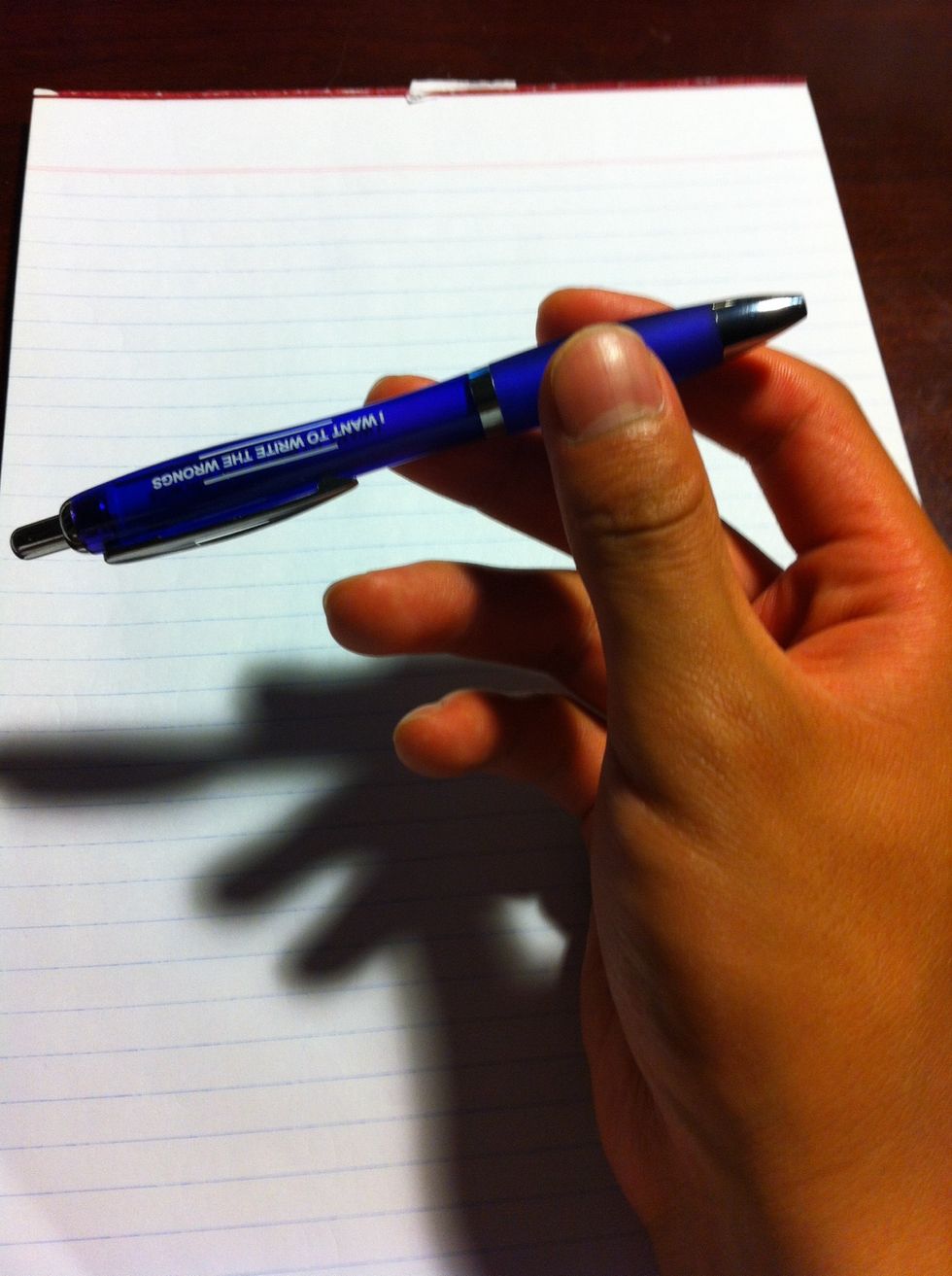 How to spin a pen in between your fingers - B+C Guides