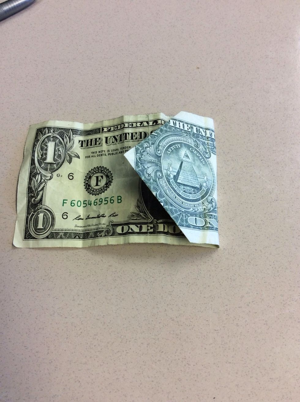 How to make an origami star out of dollar bills - B+C Guides